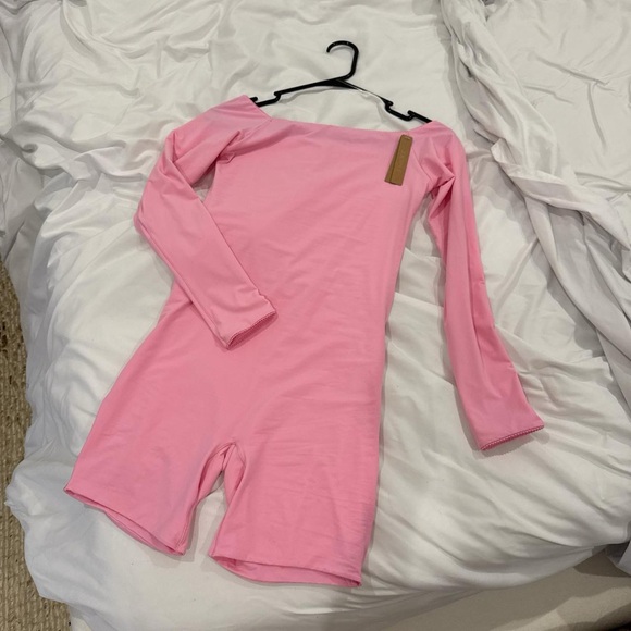 SKIMS | Pants & Jumpsuits | Skims Bubblegum Pink Open Back Onesie ...